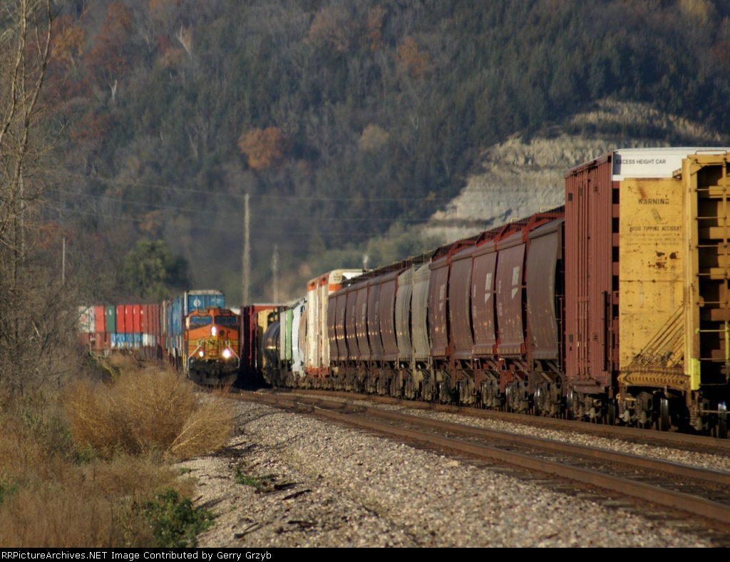 BNSF 4030 continues EB parade with double stacks as local continues homeward